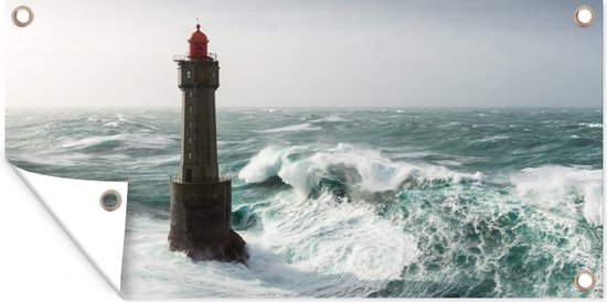 Wanddecoratie buiten Een golf achter de Vuurtoren van la Jument in Frankrijk - 160x80... | bol.com