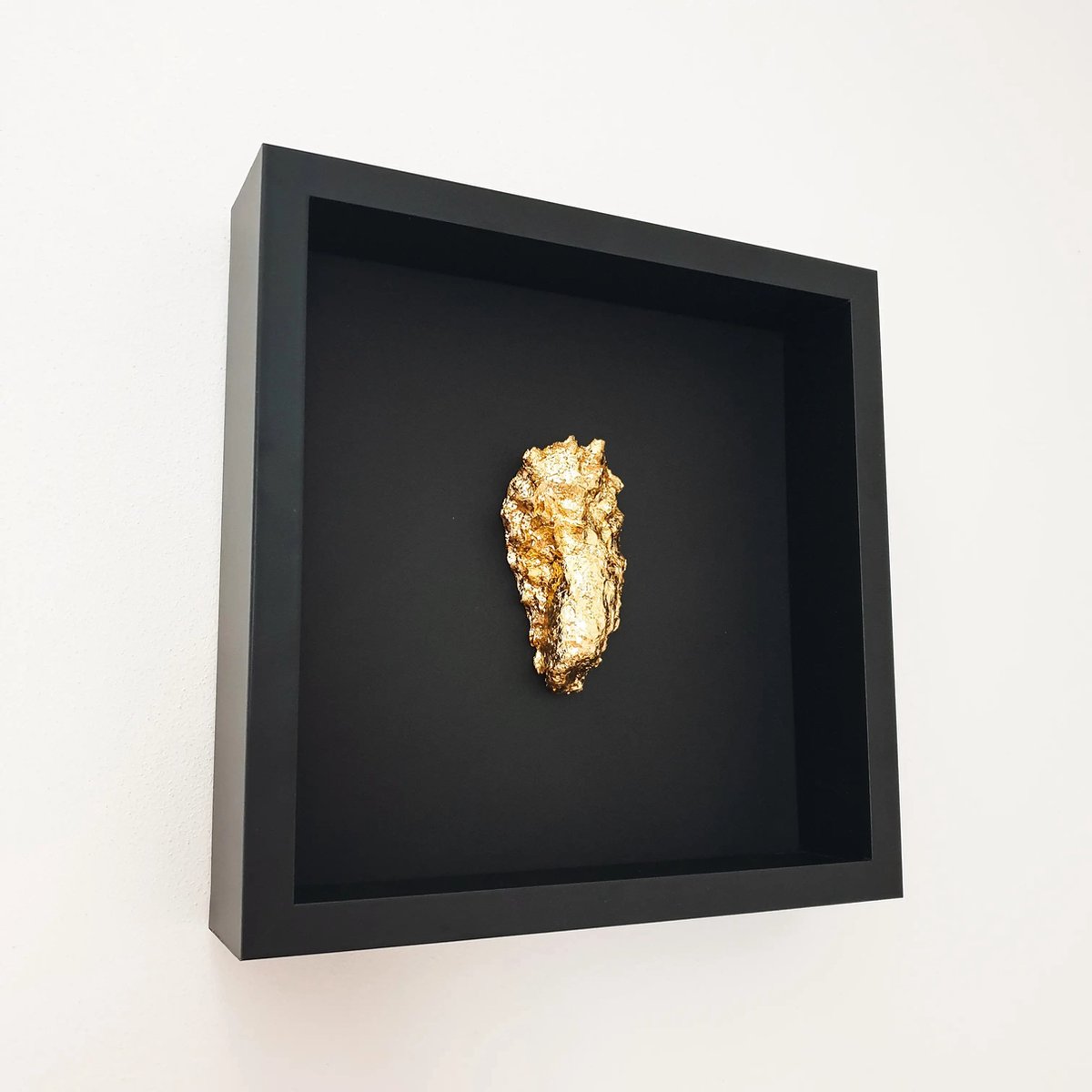 Gouden oesters in zwarte lijst | bol.com