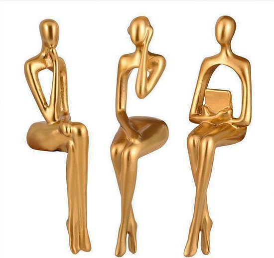 Zittende figuur, abstracte sculptuur van een denkend persoon op een ...