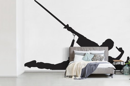 Behang - Fotobehang - een persoon met een Kungfu zwaard - Breedte 390 ...