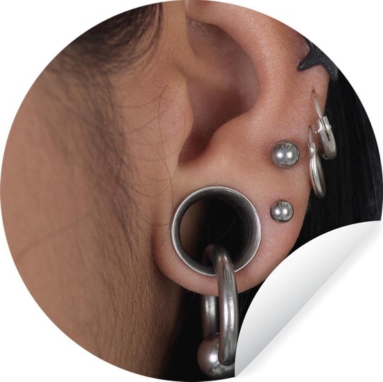 Oreille humaine remplie de piercings Sticker papier peint cercle mural ...