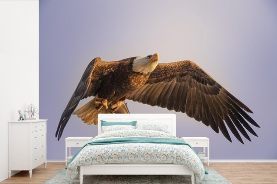 Behang - Fotobehang Vliegende arend met vis tussen zijn poten - Breedte ...