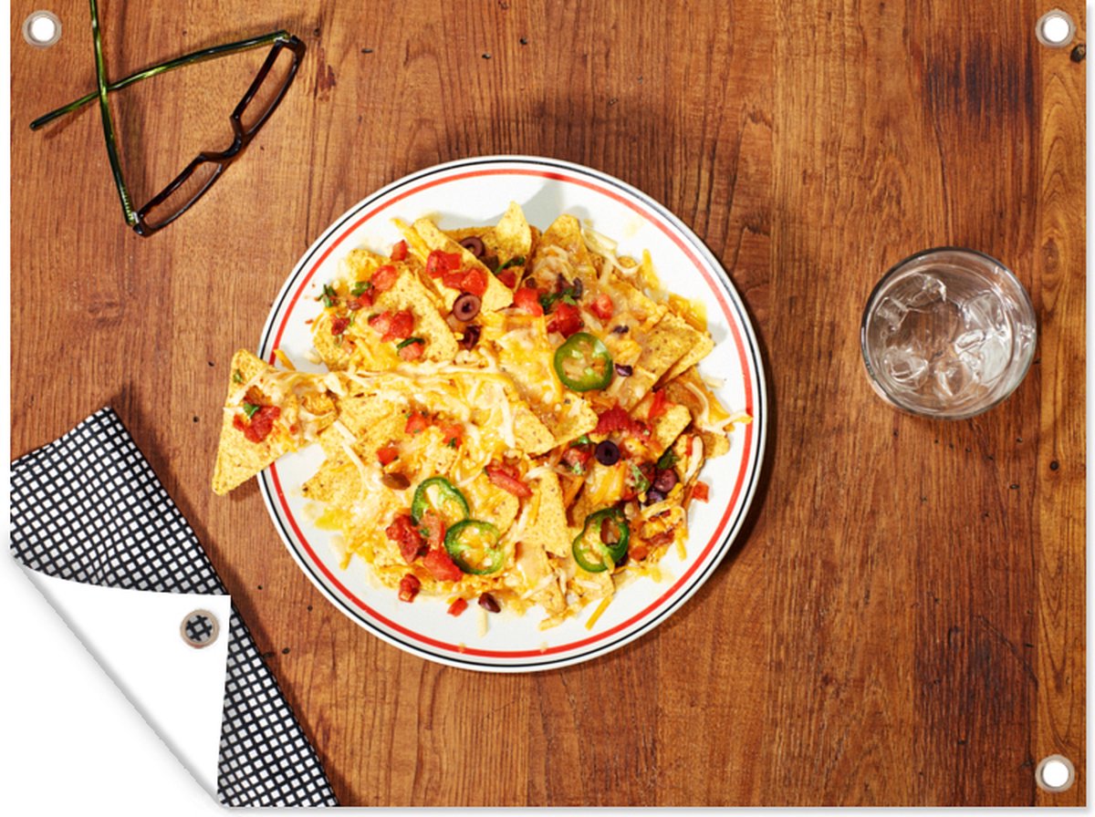 Tuin decoratie Een overheerlijke schaal met nacho's staat klaar op de ...