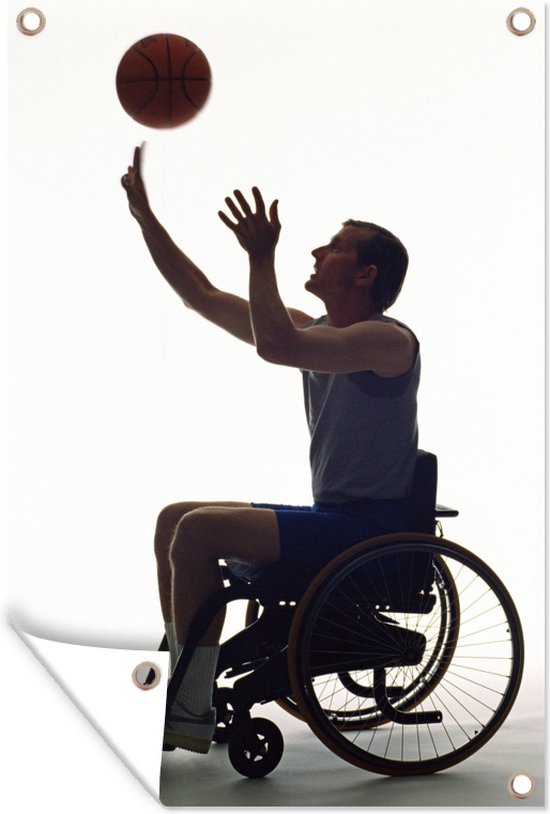 Tuindecoratie Een silhouet van een rolstoelbasketballer die schiet op ...