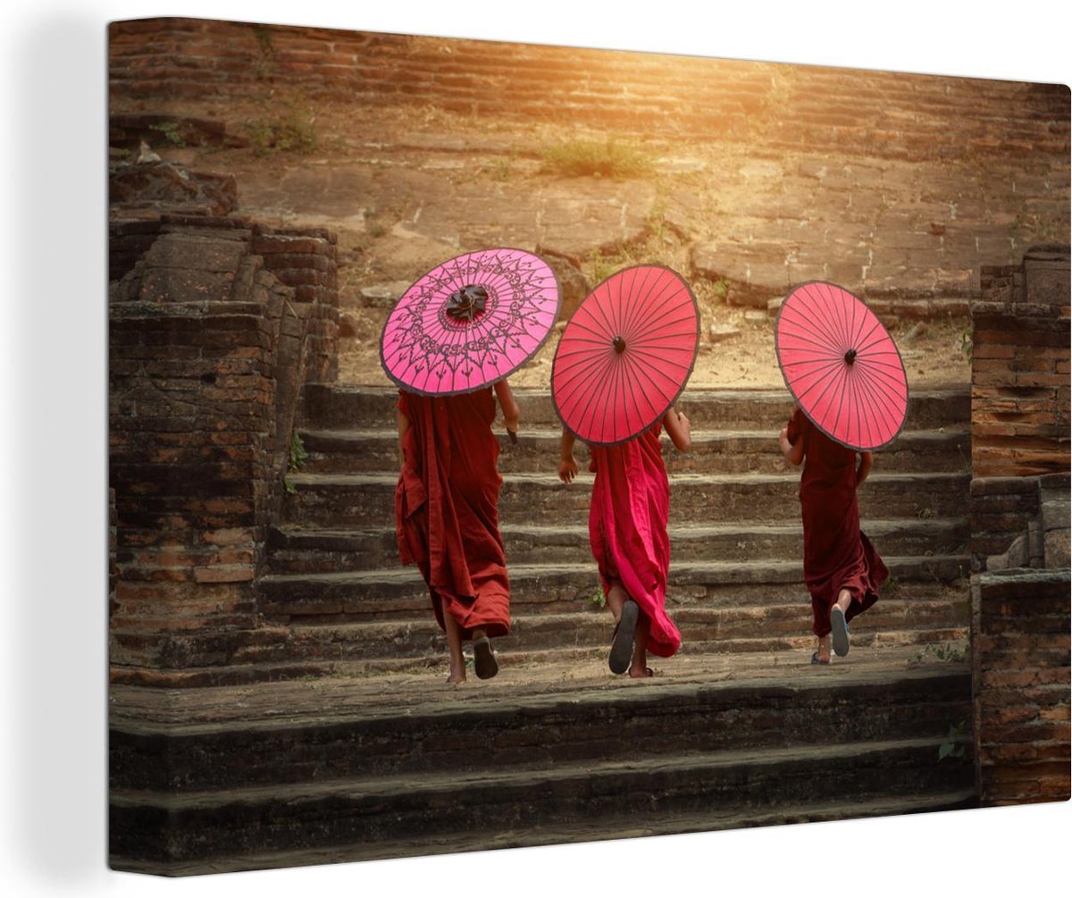 Canvas Schilderij Drie vrouwen in Myanmar - 150x100 cm - Wanddecoratie | bol.com