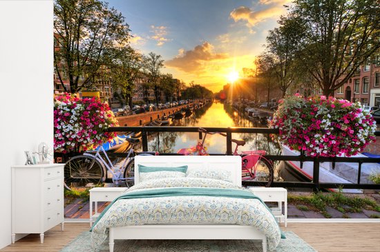 Behang - Fotobehang Amsterdam - Bloemen - Brug - Fiets - Zonsondergang ...
