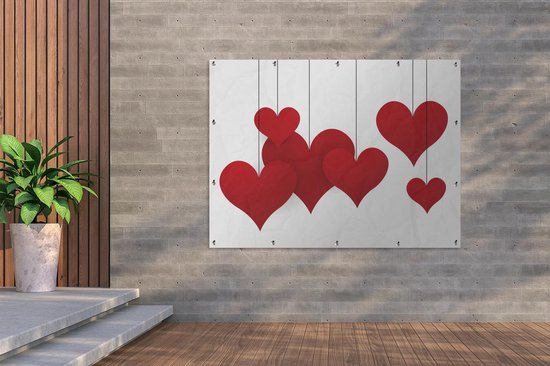 Muurdecoratie buiten Een illustratie van rode hartjes aan dunne ...