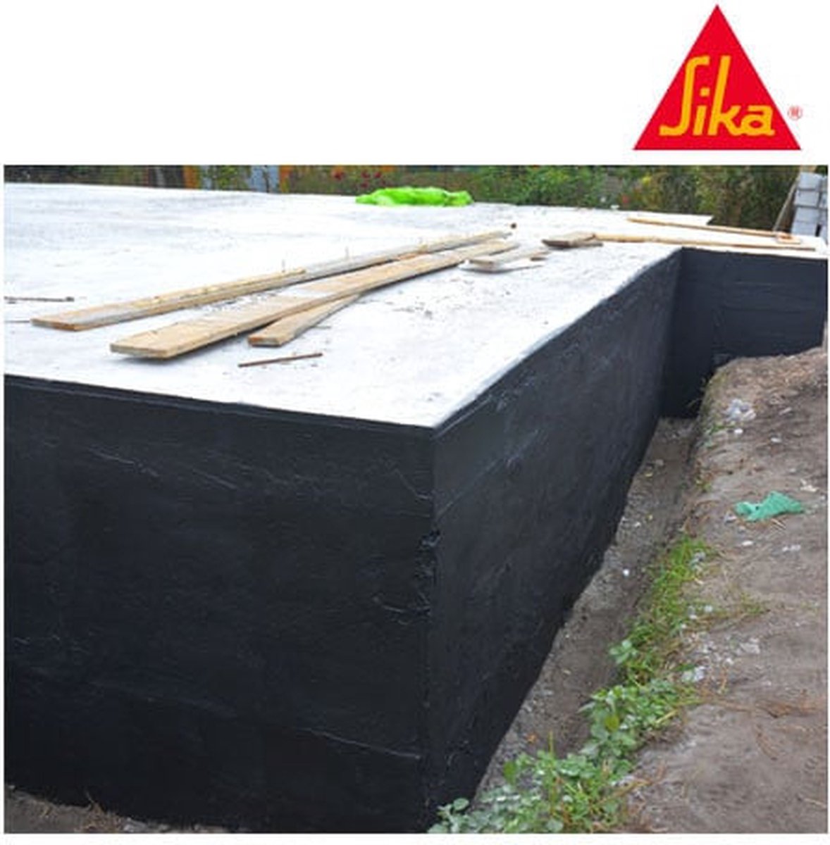 Collage d'isolant thermique et protection de fondation SIKA Igakol ...