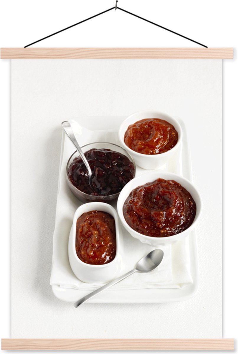 Différents types de chutney en tasses blanches assiette école lattes ...