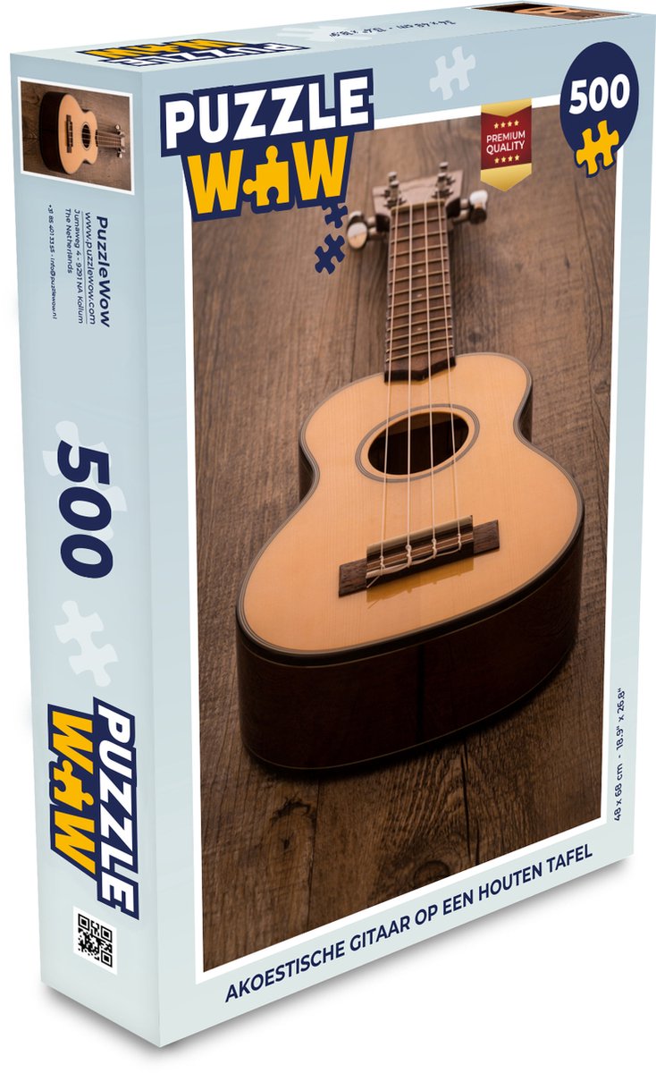 Puzzel Akoestische gitaar op een houten tafel - Legpuzzel - Puzzel 500 ...