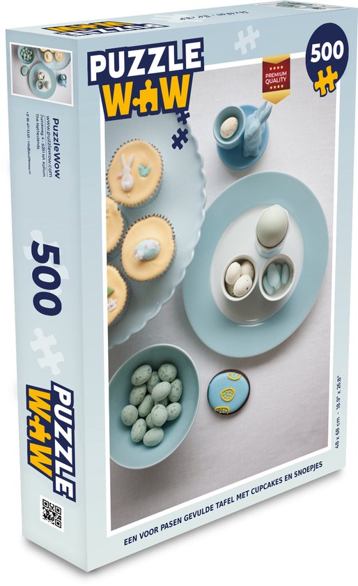 Puzzel Een voor Pasen gevulde tafel met cupcakes en snoepjes ...