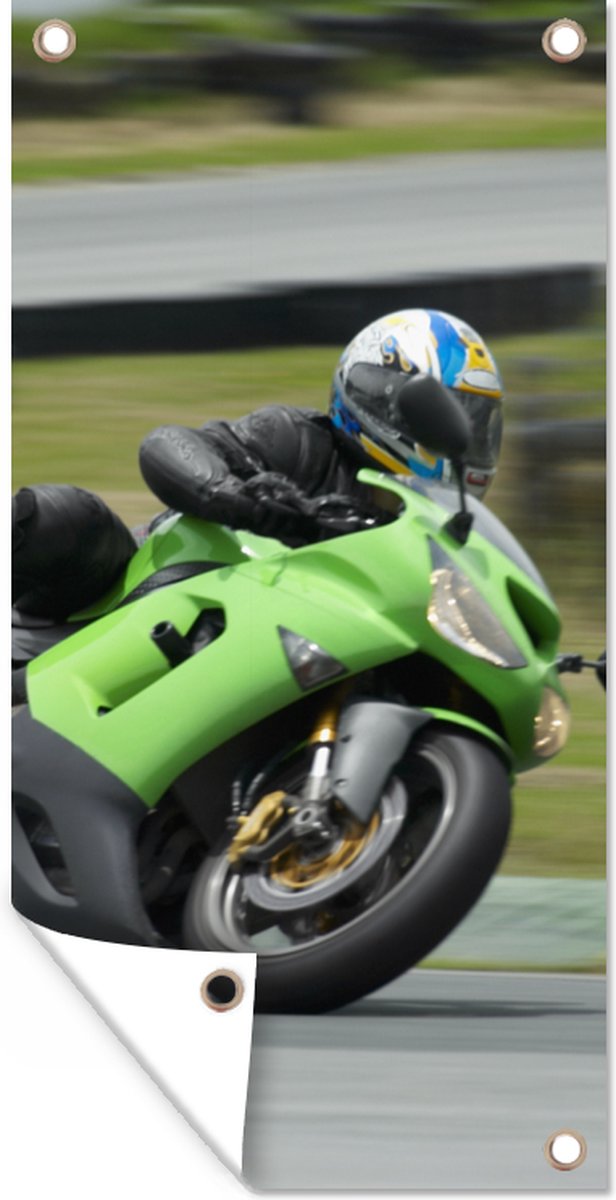 Décoration murale d'extérieur Une moto de course assise dans une courbe ...
