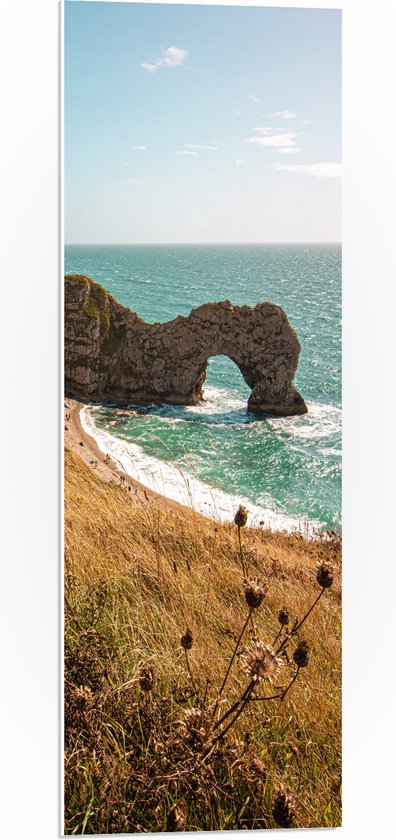 WallClassics - PVC Schuimplaat - Zee met Grote Rots met Gat - 30x90 cm ...