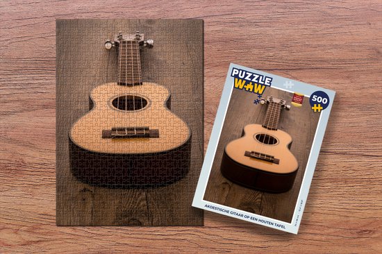 Puzzel Akoestische gitaar op een houten tafel - Legpuzzel - Puzzel 500 ...