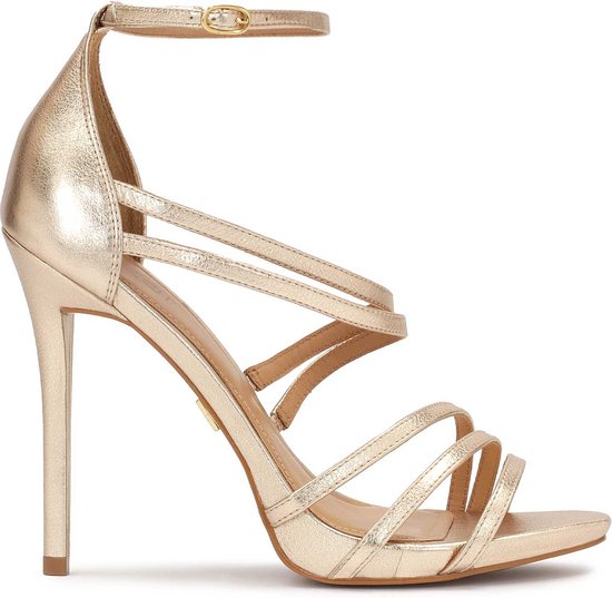 Golden sandals on a heel with diagonal straps | bol