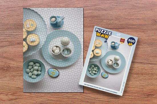 Puzzel Een voor Pasen gevulde tafel met cupcakes en snoepjes ...