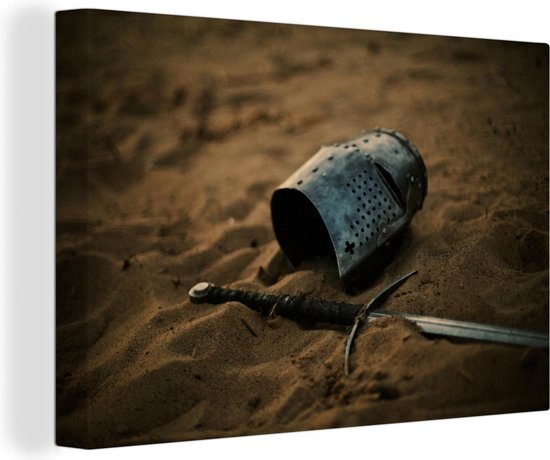 Canvas Schilderij Een helm en zwaard uit de middeleeuwen liggen in het ...