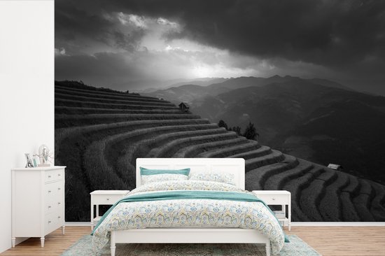 Behang - Fotobehang Zonsondergang vanaf een hooggelegen rijstveld in ...