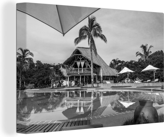 Canvas schilderij 180x120 cm - Wanddecoratie Tropische villa met groot zwembad -... | bol