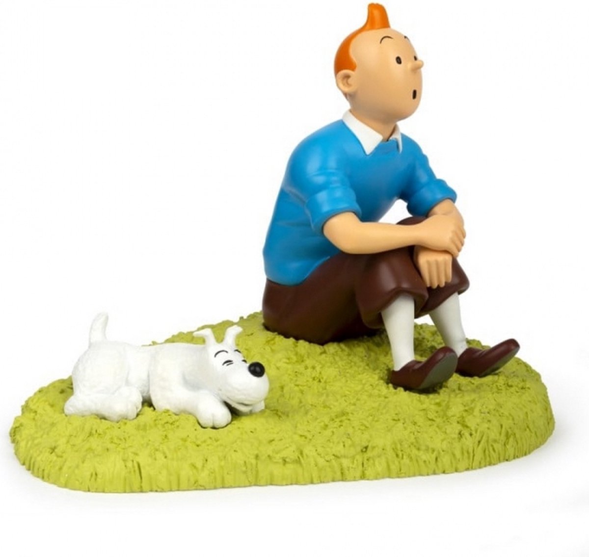 Kuifje zittend in het gras. Officieel Kuifje beeld gemaakt door ...
