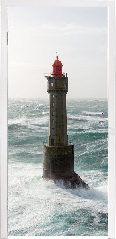 Deursticker De Franse Vuurtoren van la Jument tussen de golven - 90x205 cm - Deurposter | bol.com