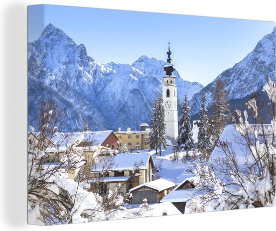 Canvas Schilderij Sneeuw in een bergdorp in Zwitserland - 60x40 cm ...