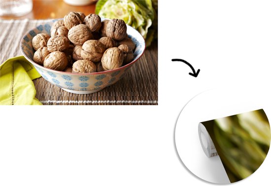 Behang - Fotobehang Decoratieve kom met walnoten op een rustieke tafel - Breedte 420... | bol
