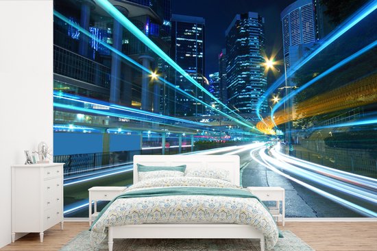 Behang - Fotobehang De snelheid van het licht op een weg in Hong Kong ...