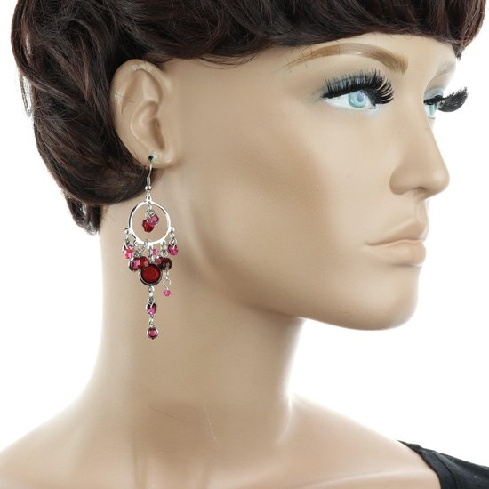 Zilverkleurige oorbellen met roze en rode hangers | bol