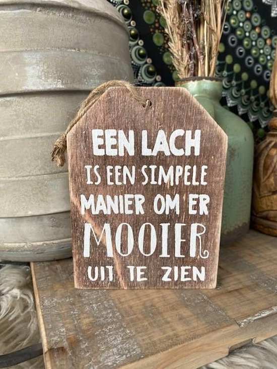 Hanger / label / met de tekst; Een lach is een simpele manier om er ...