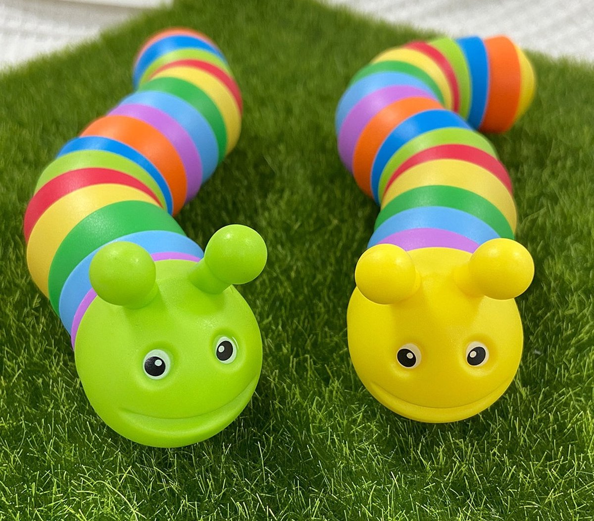 Magic Slug - Snail - Relax Rups Regenboog - Fidget Toy - 17 cm | bol.com