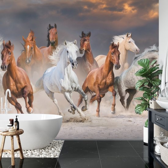 Fotobehang Kudde Galopperende Paarden | bol
