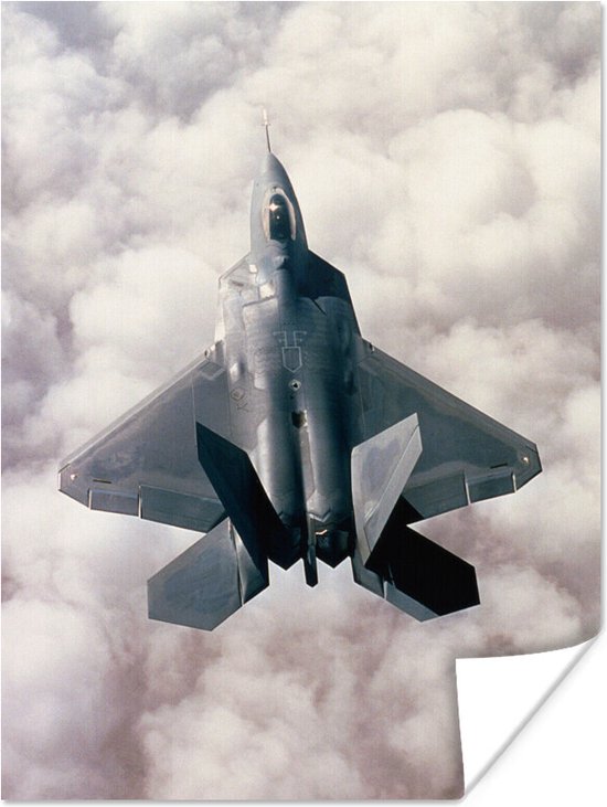 Poster De bovenkant van een straaljager met veel witte wolken - 120x160 ...