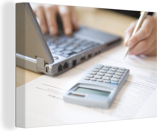 Canvas Schilderij Rekenmachine met laptop en pen - 150x100 cm ...