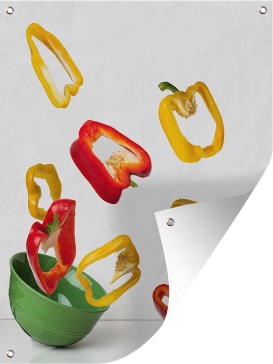 Tuin decoratie Rode en gele paprika's komen uit een groene kom - 30x40 ...