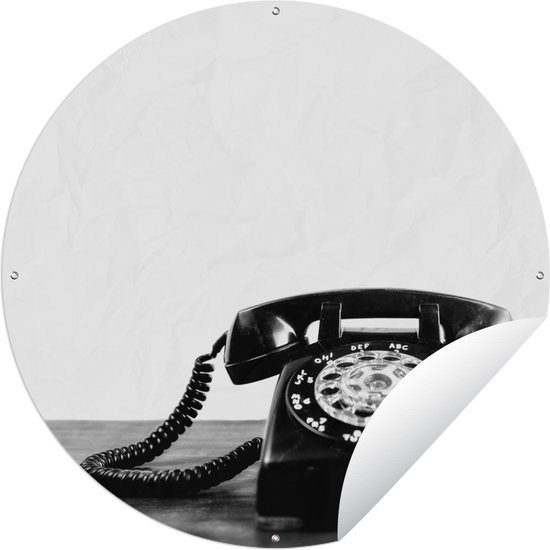 Tuincirkel tekening van een retro telefoon op een houten tafel - zwart ...