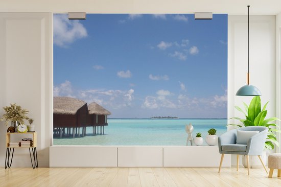 Behang - Fotobehang Houten hut bij de zee in de Malediven - Breedte 325 ...