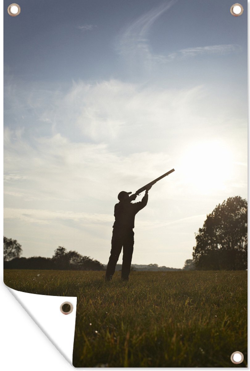 Tuinposters buiten Een jager met zijn geweer tijdens de jacht - 60x90 cm - Tuindoek | bol.com