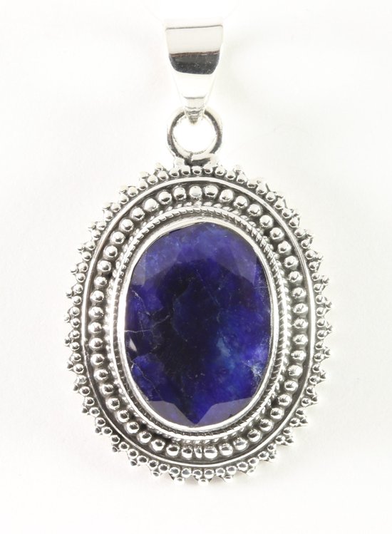 Bewerkte zilveren hanger met blauwe saffier | bol