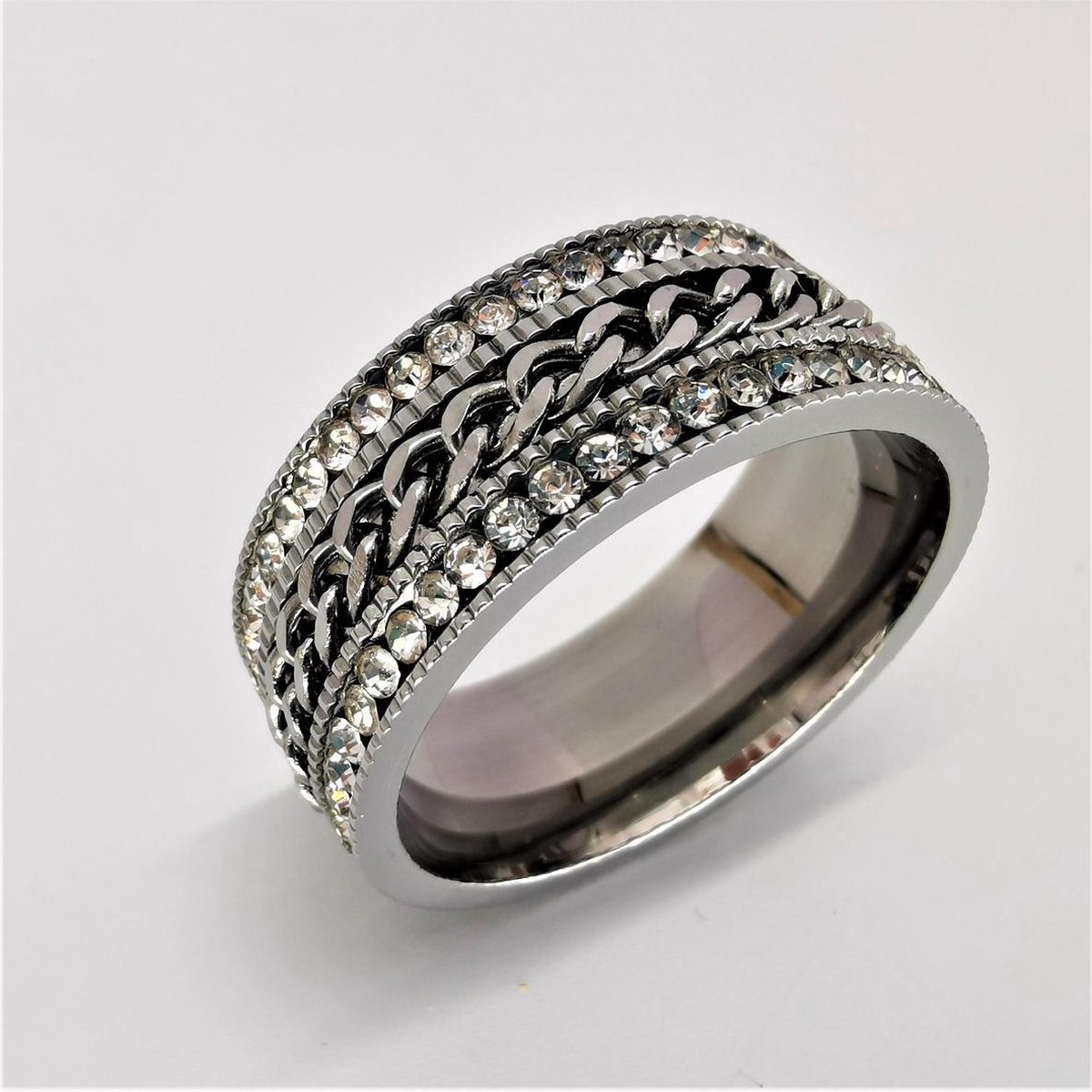 Chique brede dames RVS ring met beide zijde strass steentjes en midden ...