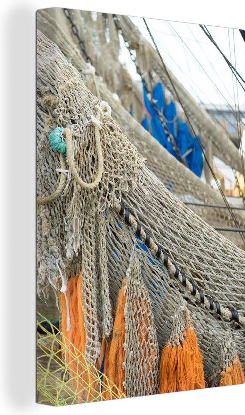 Canvas schilderij 120x180 cm - Wanddecoratie Gekleurde visnetten in de ...
