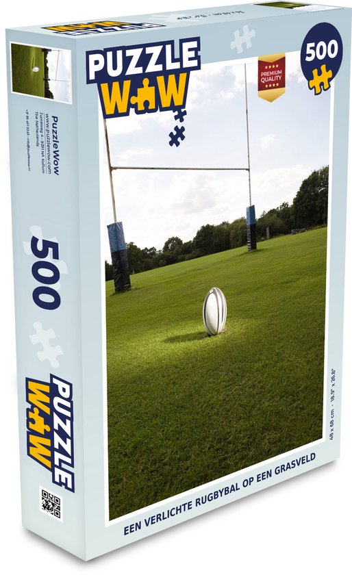 Puzzel Een verlichte rugbybal op een grasveld - Legpuzzel - Puzzel 500 ...