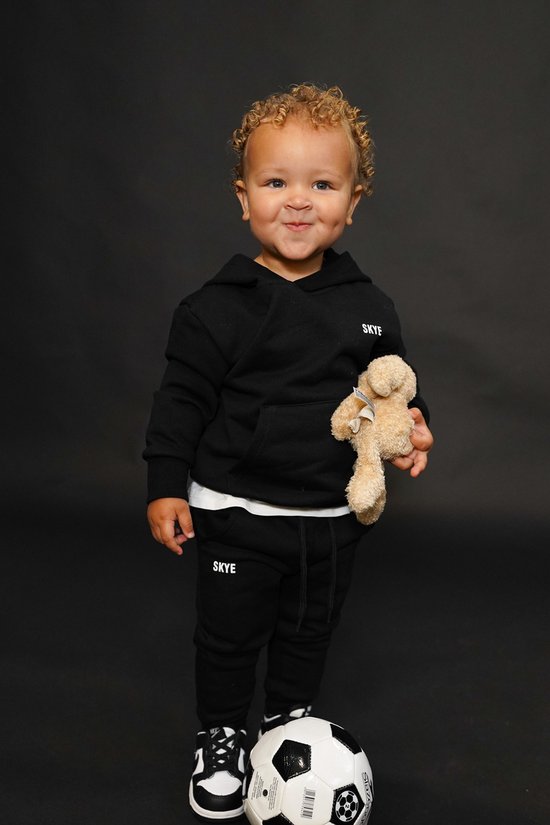 SKYE Clothing Unisex Kinder Trainingspak Zwart | bol