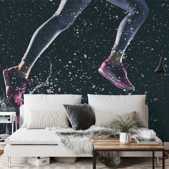 Fotobehang Sprinter Loopt In De Regen 3D | bol