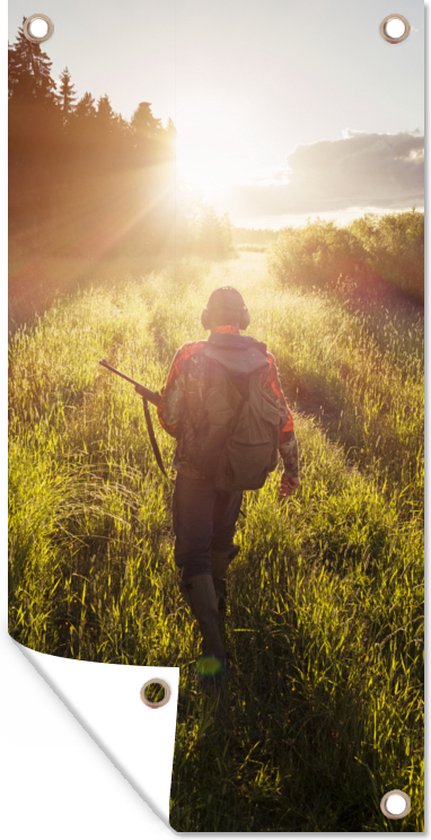 Décoration murale d'extérieur Un chasseur chasse au lever du soleil ...