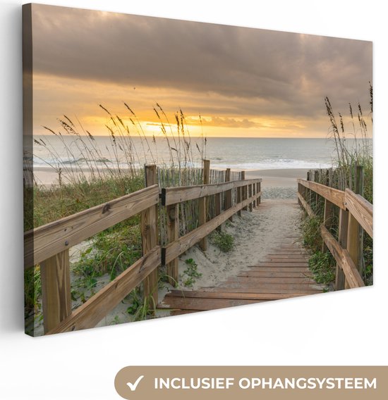 Canvas Schilderij Strand - Hek - Zonsondergang - Zee - Duin - 140x90 cm - Muurdecoratie | bol