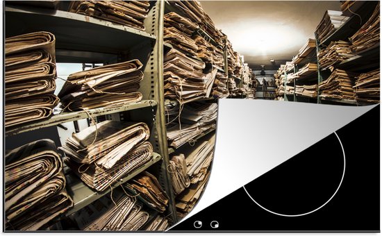 Inductie beschermer - Inductie Mat - Stapels oude kranten in het ...