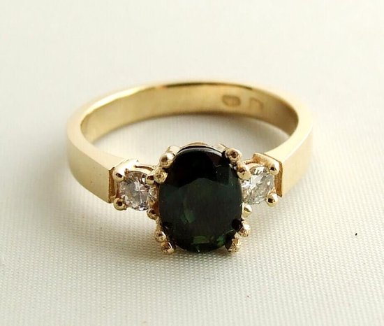 Christian gouden ring met groene saffier | bol