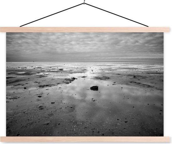 Schoolplaat - Wolken weerspiegelen in de plassen van de Waddenzee ...