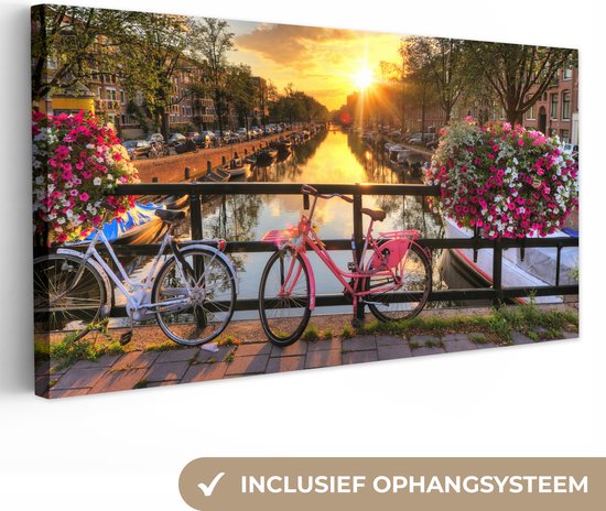 Canvas Schilderij Amsterdam - Gracht - Zonsondergang - Bloemen - Fiets ...